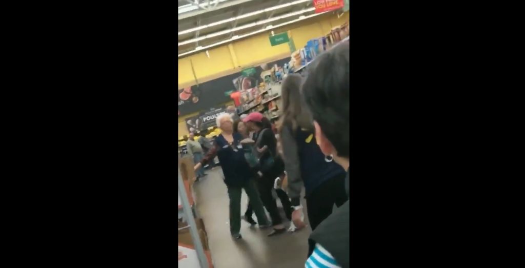 Woman With Baby Strapped to Chest Breaks Out in a Brawl at WalMart